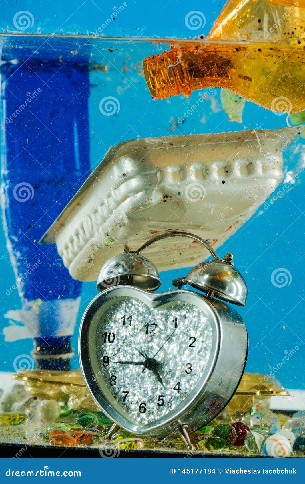 Thrown Silver Heard Shaped Clock Placed on the Bottom Stock Photo ...
