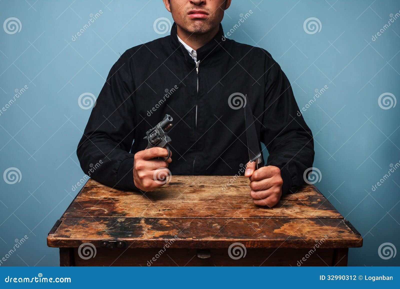 Thug at Table with Gun and Knife Stock Photo - Image of multi, mafia ...