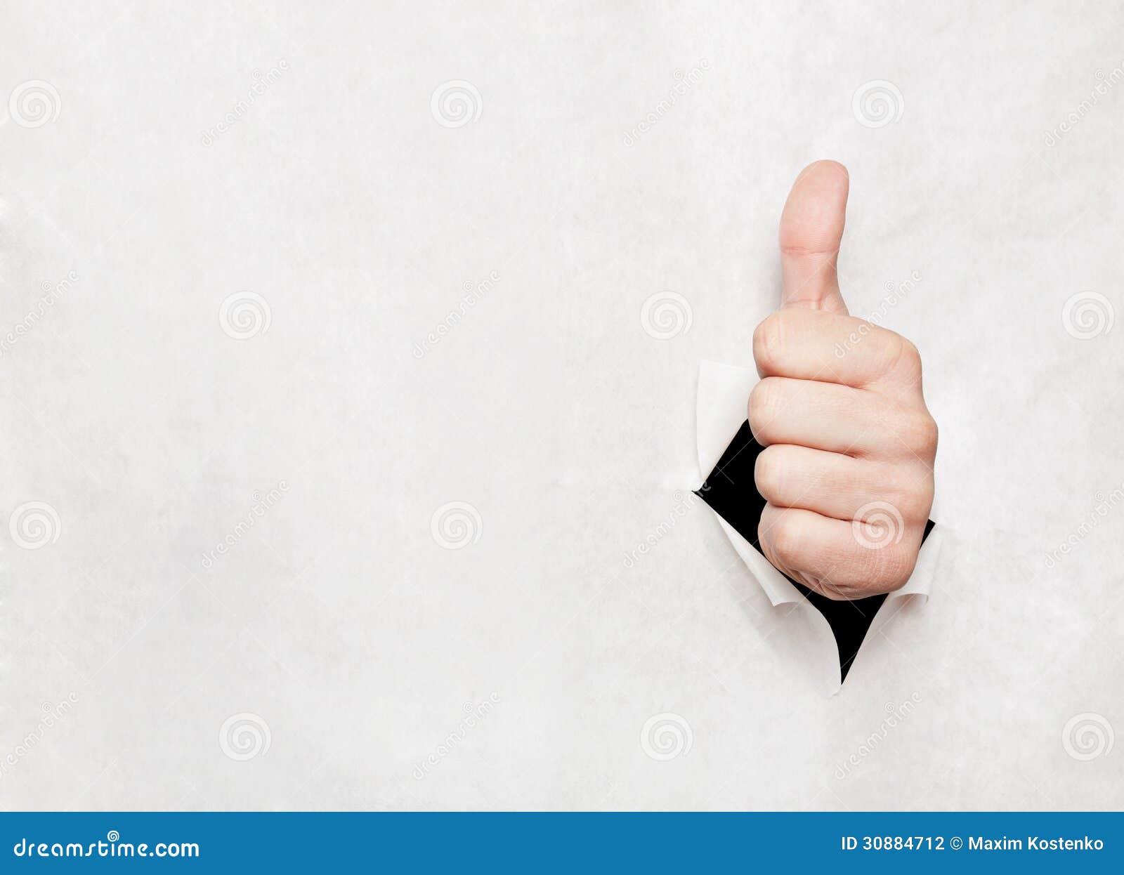 Thumb Up through a Hole in Paper Stock Photo - Image of good, wall ...