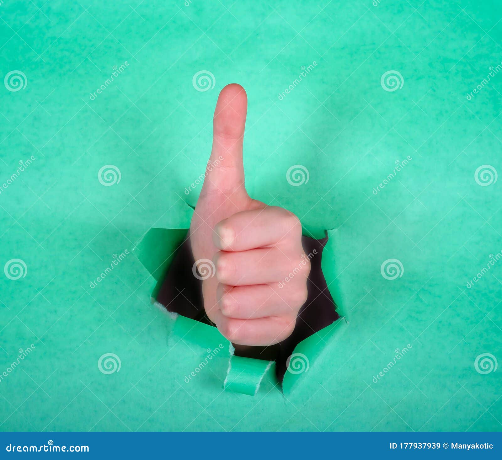 Thumb up through stock image. Image of thumb, breakthrough - 177937939