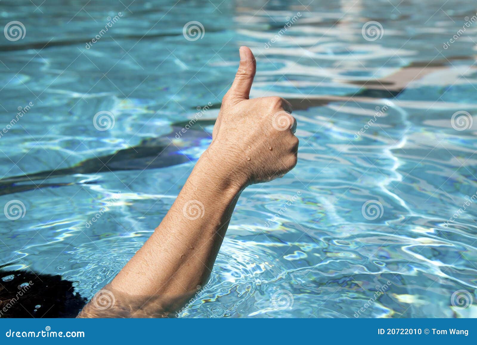 Thumb up in the water stock photo. Image of successful - 20722010