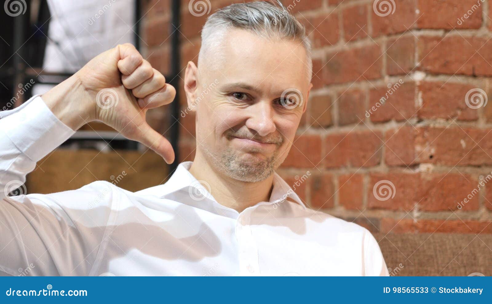 Thumbs Down by Middle Age Man Stock Image - Image of business, gesture ...