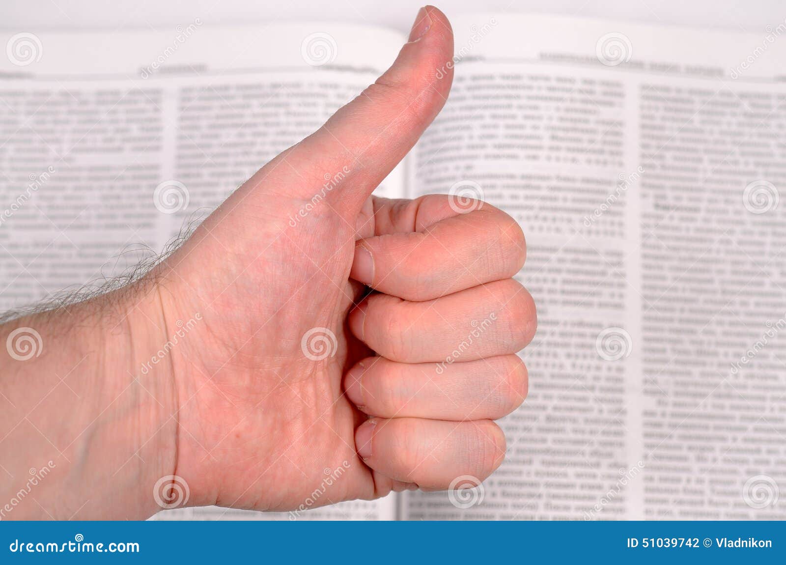 Thumbs up and book. stock photo. Image of literary, green - 51039742