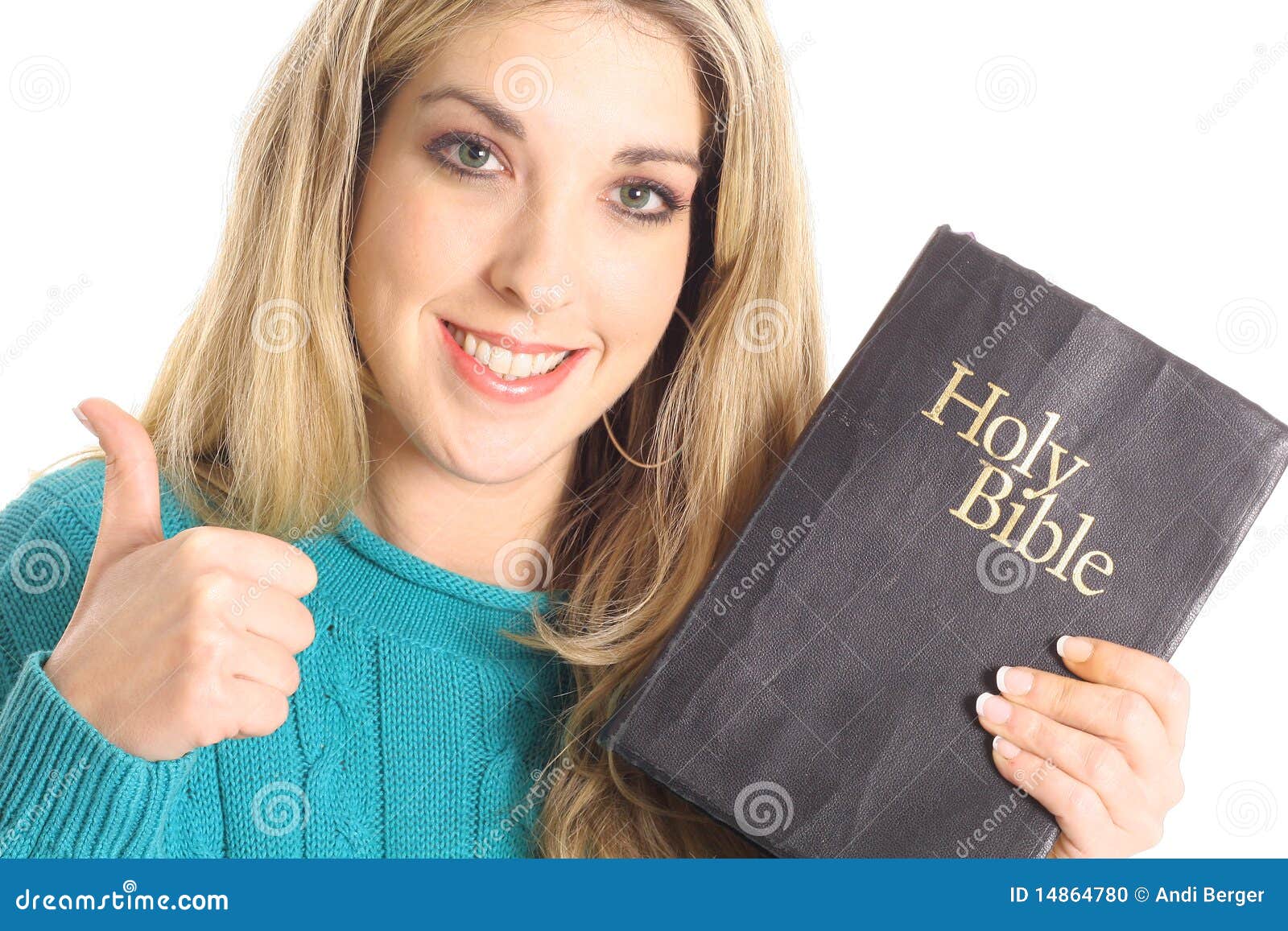 Thumbs up girl with bible stock photo. Image of hope - 14864780