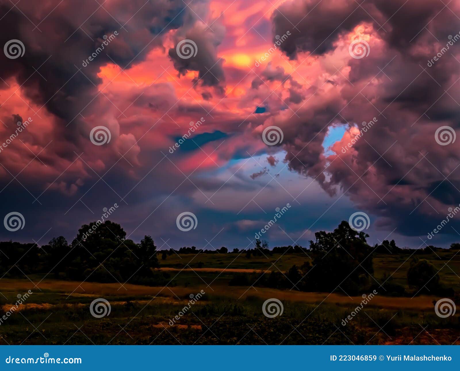 Thunderclouds in the Pink Rays of the Sunset. Stock Image - Image of ...
