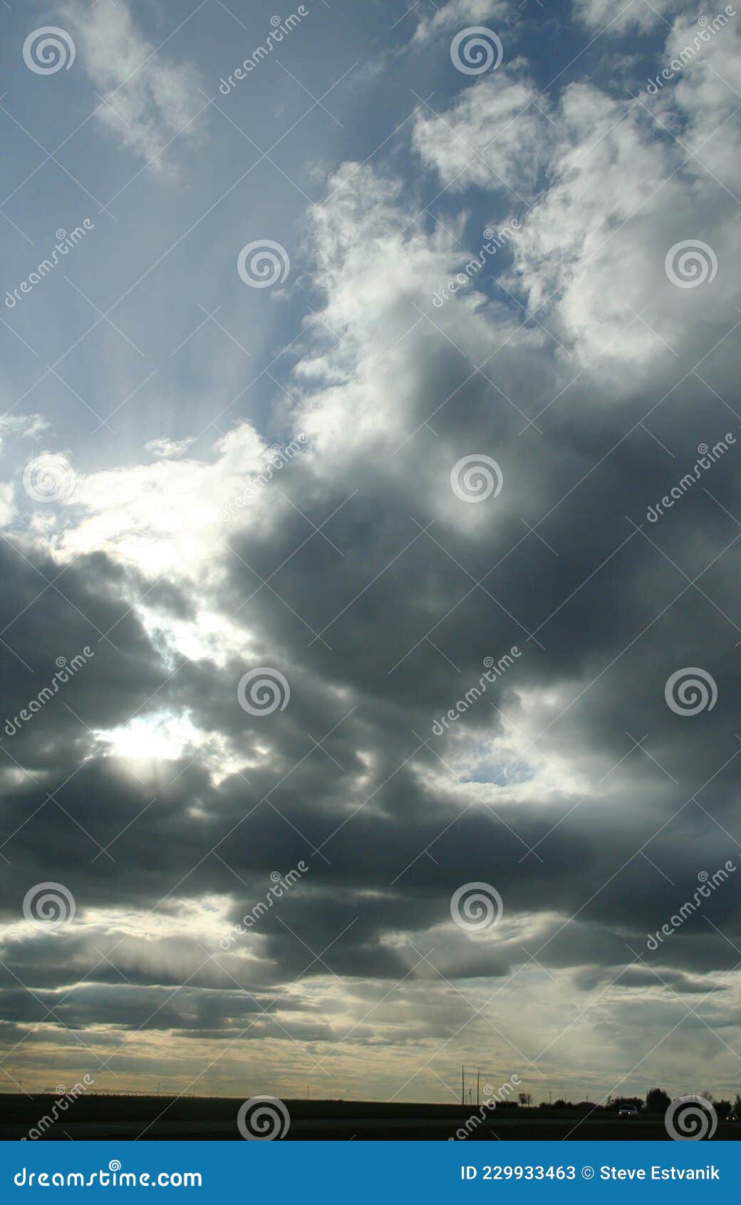 A Thunderstorm Is Coming. Grass And Trees Grow On The Riverbank, And A ...