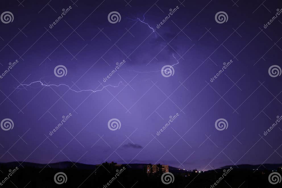 Thunderstorm Lightning in the Blue Purple Evening Sky Stock Photo ...