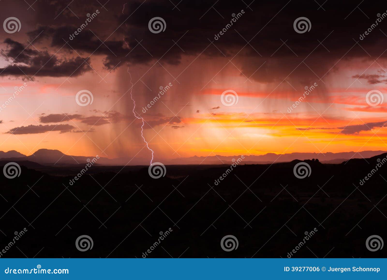 Thunderstorm and Lightning Strike at Sunset Stock Photo - Image of ...
