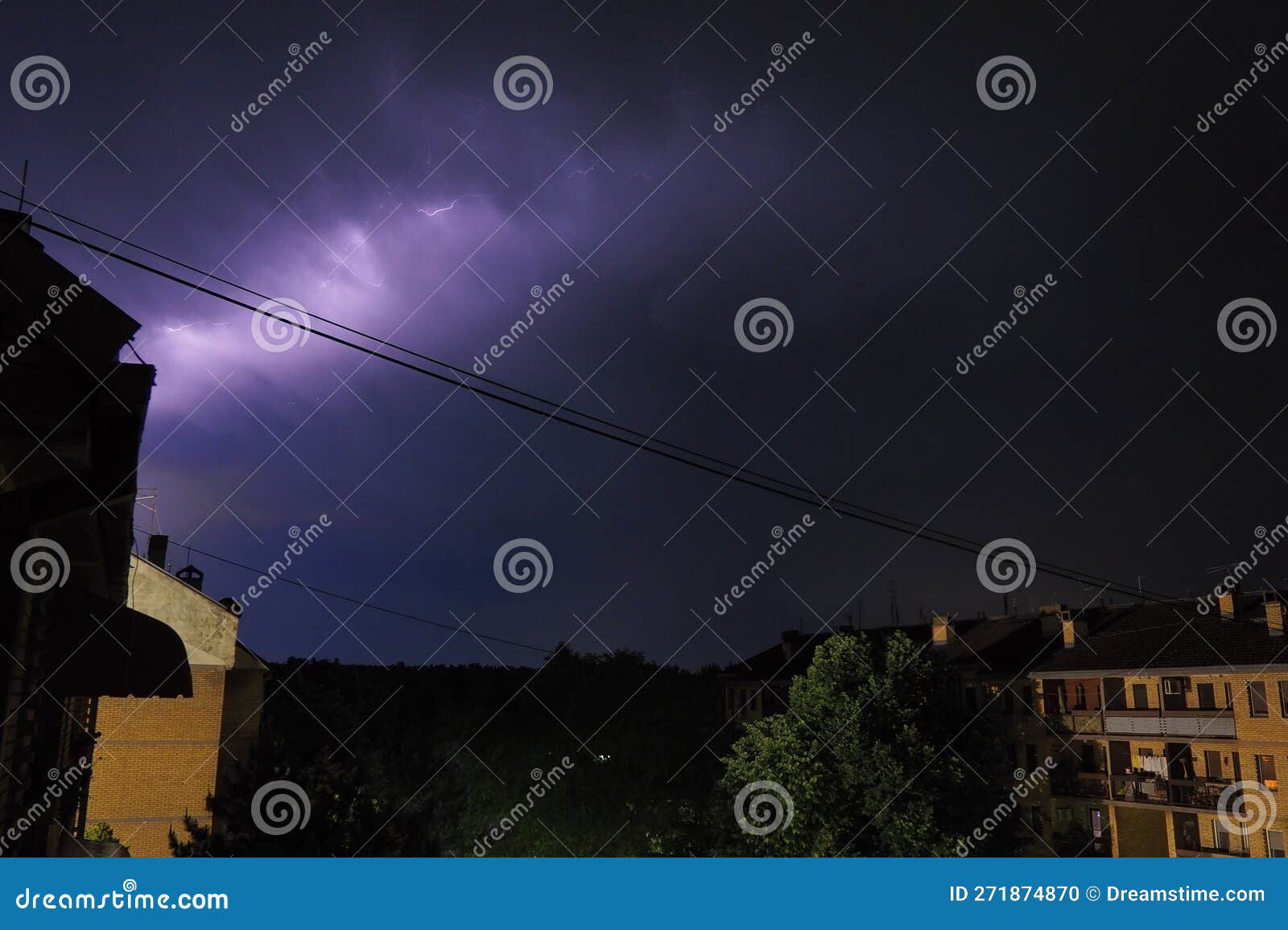 Thunderstorm at Night Over the City. Flashes of Lightning and Low ...
