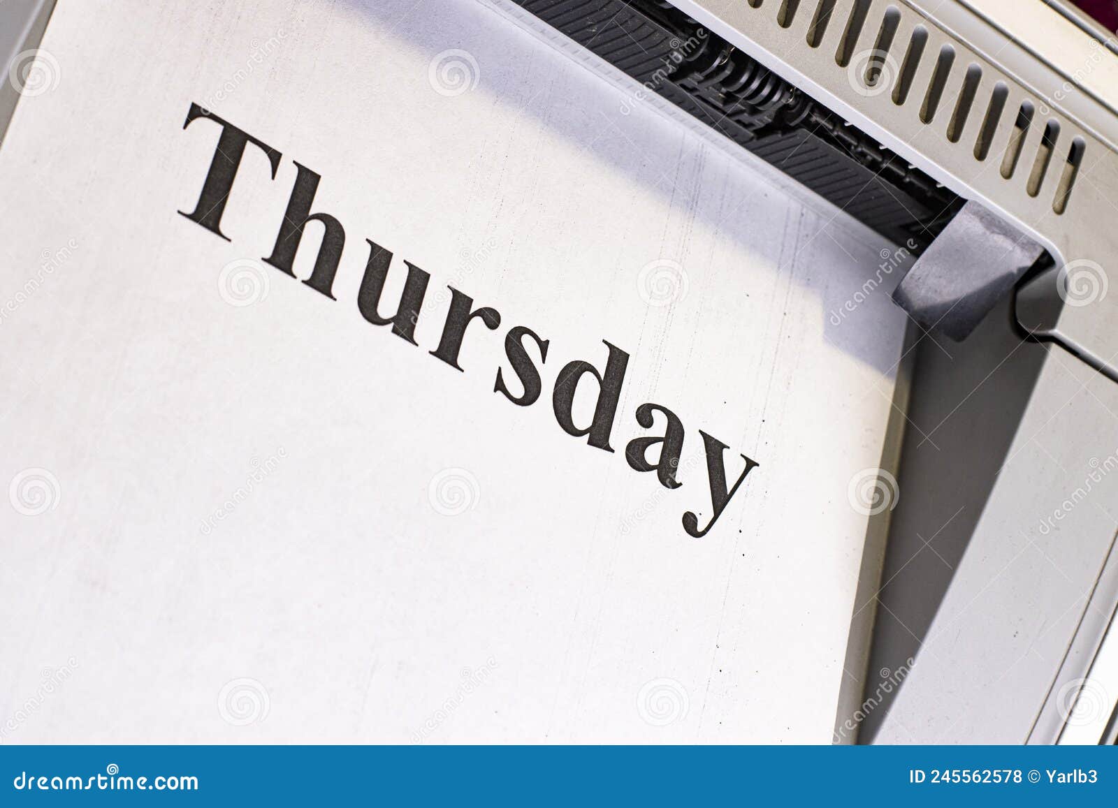 Thursday, a White Sheet of Paper on an Office Printer, the Concept of ...