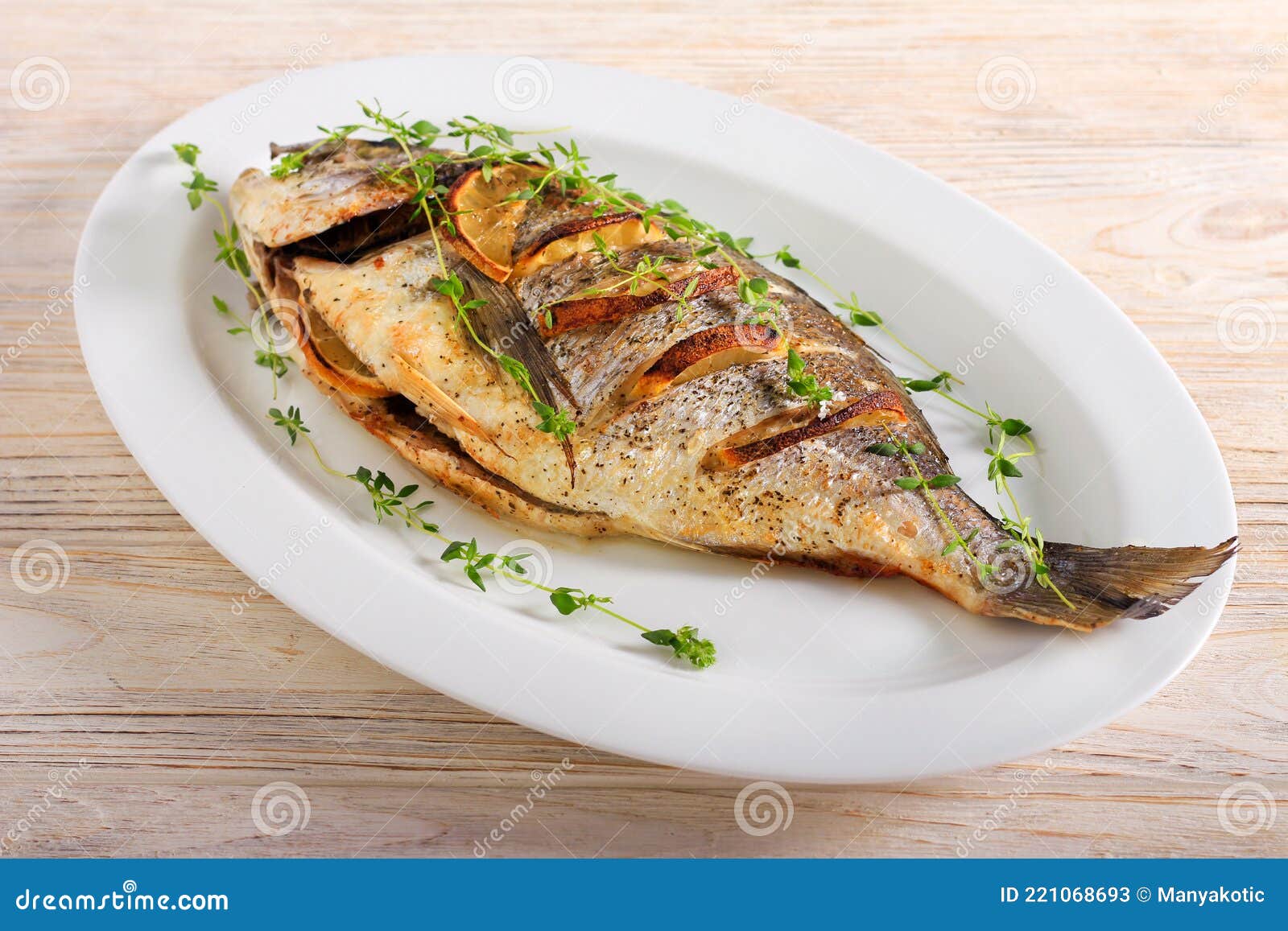 Thyme and Lemon Baked Sea Bream Fish Stock Image - Image of dinner ...
