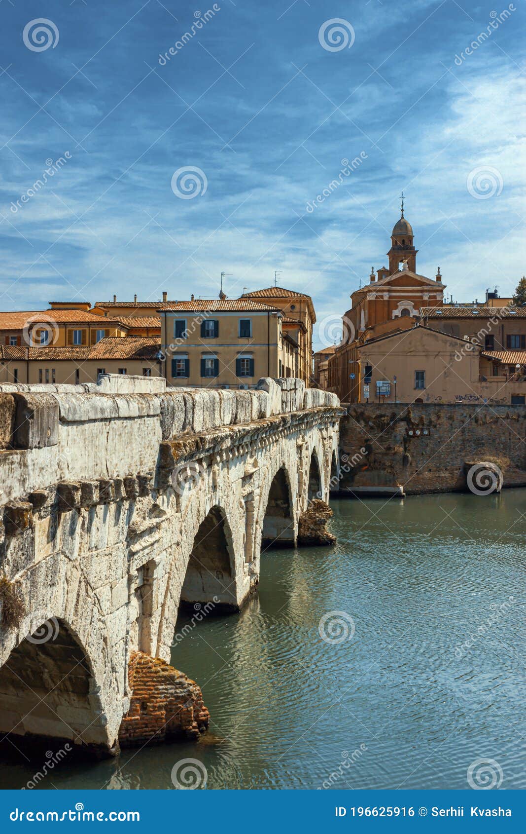 Tiberius Bridge in Rimini on a Background of Blue Sky with White Clouds ...