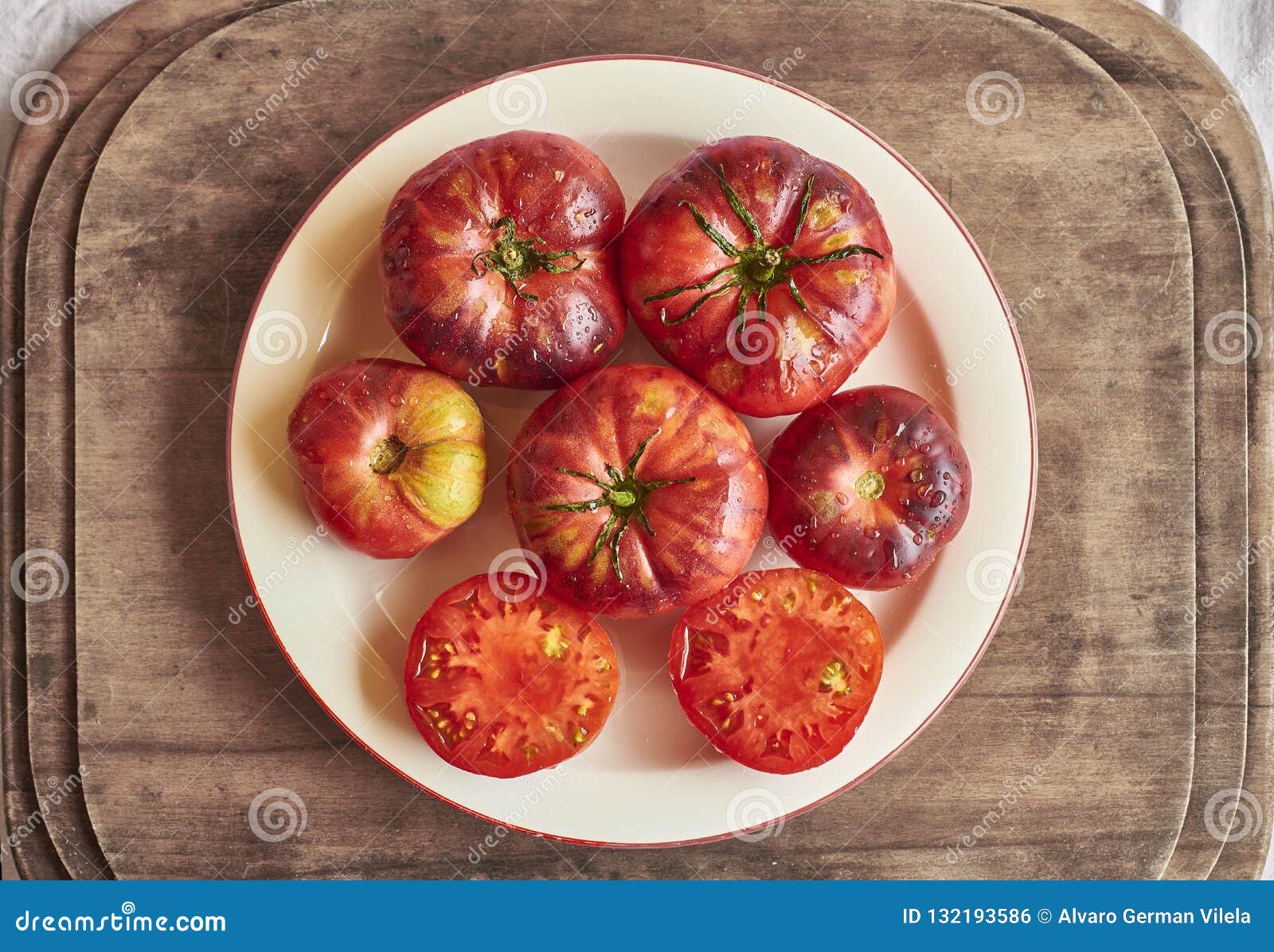Tibet Apple Tomatoes Over a Rustic Table Stock Photo - Image of ...