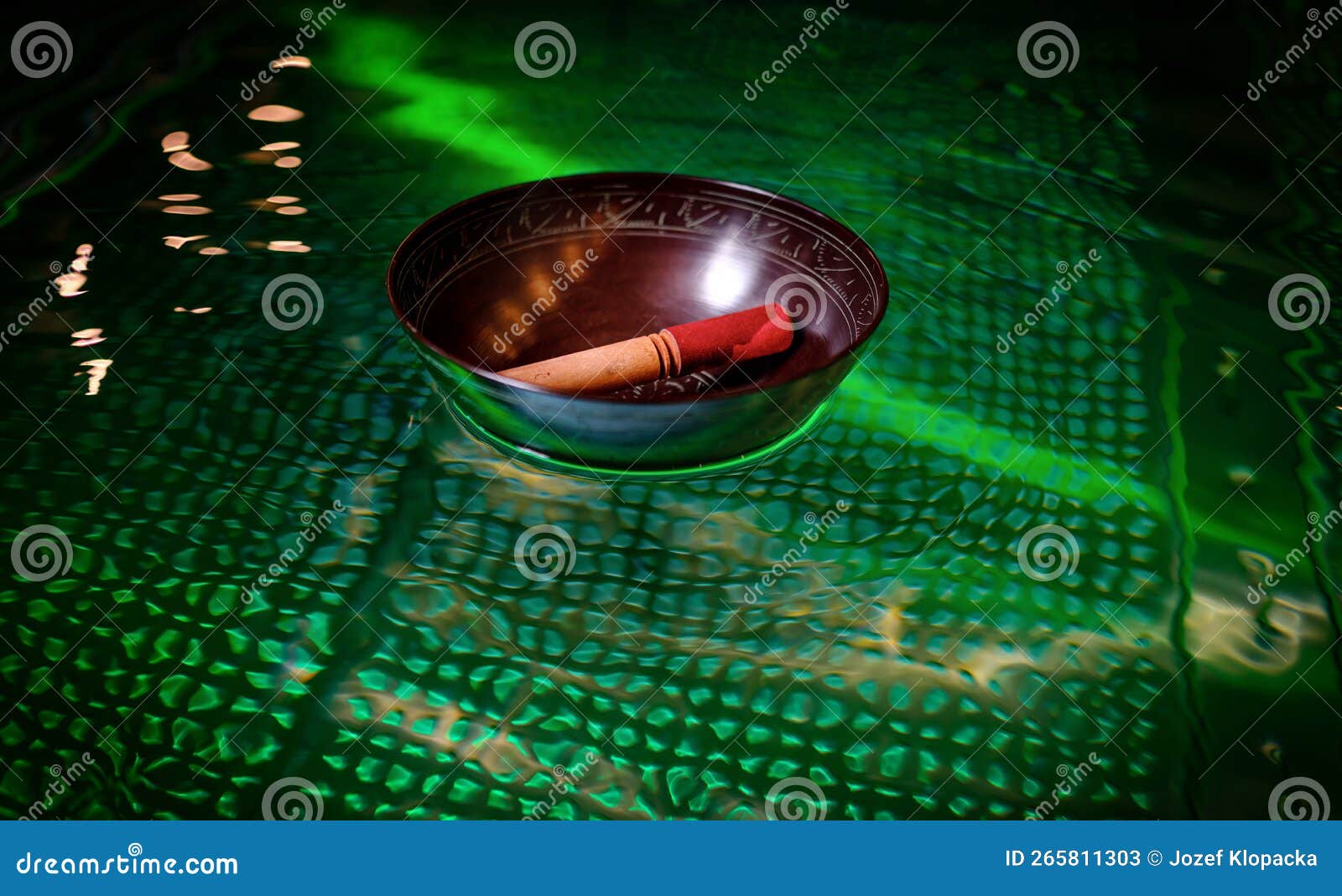 Tibetan Bowl On The Surface Of The Pool Water Relaxation And Deep Meditation Stock Image