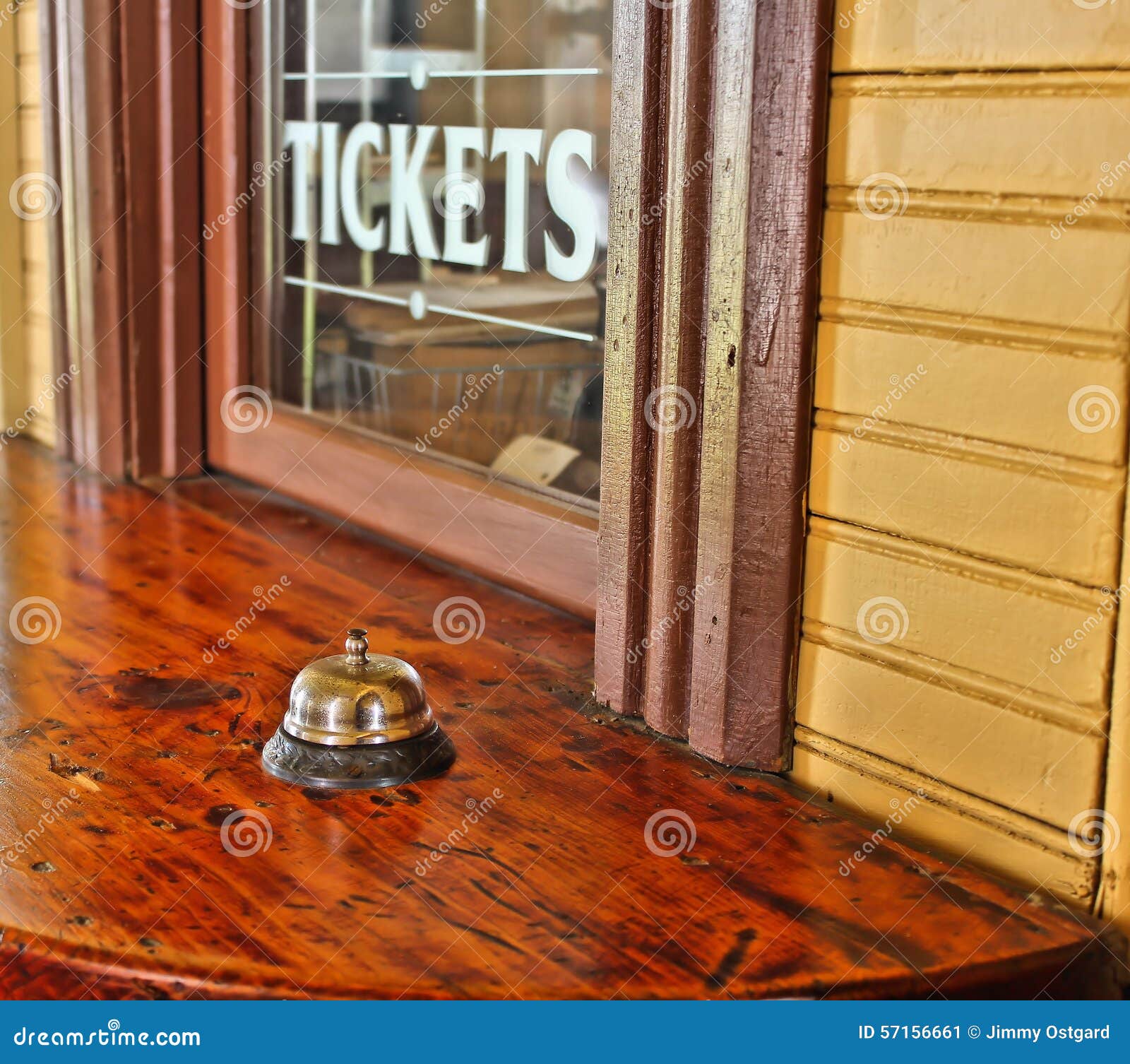 Ticket Window Sign In White Text, With A Green And Brick Background ...
