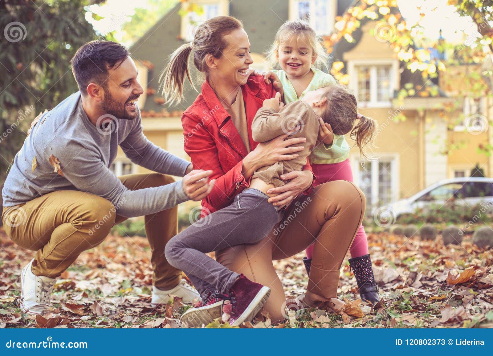 Tickling with Family is Fun. Stock Image - Image of little, people ...