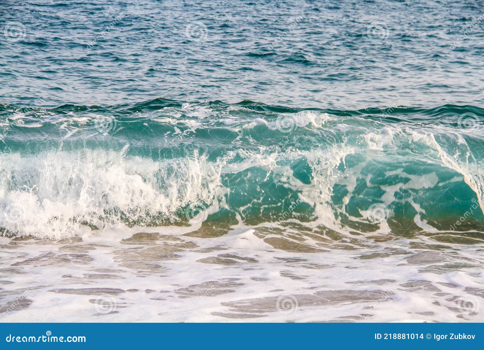 Tidal Bore. Blue Waves with Bats Rolling Onto a Sandy Beach Stock Photo ...