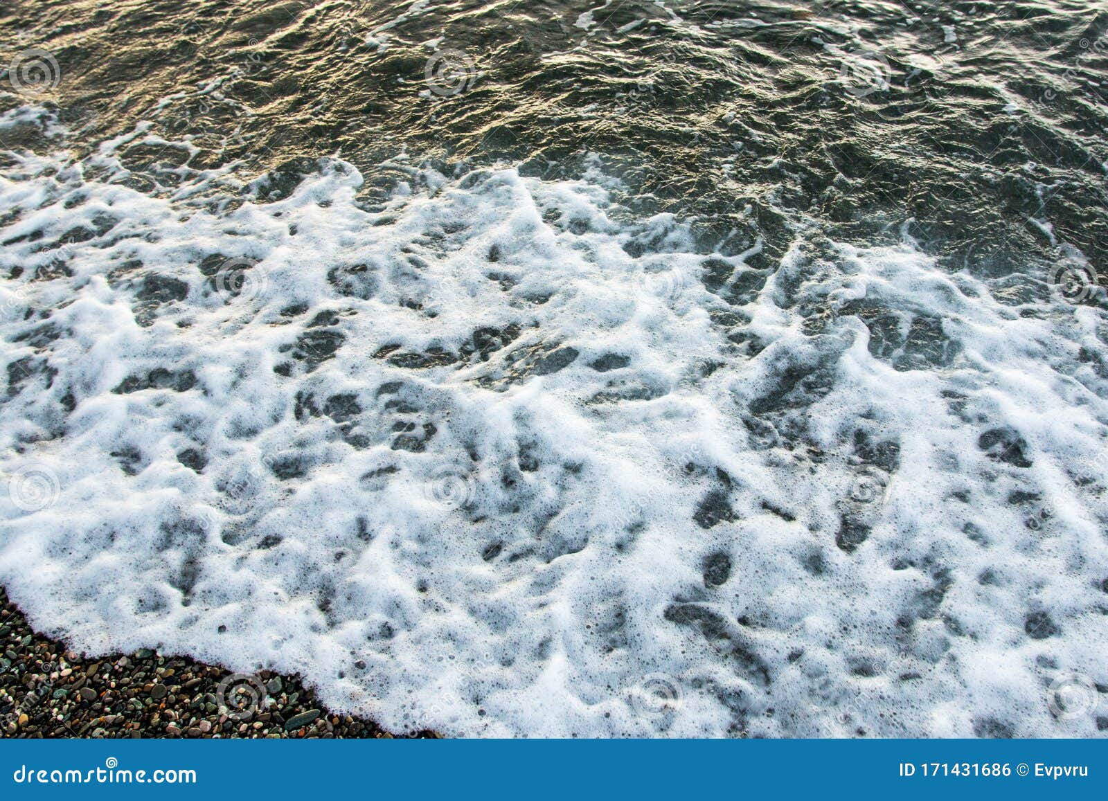 The Wave Rolls Onto the Seashore, Which is Covered with Small Stones ...