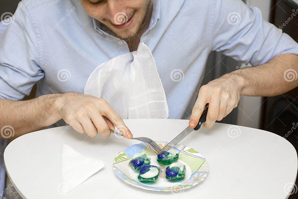 Tide pod challenge stock image. Image of hand, pods - 141126991