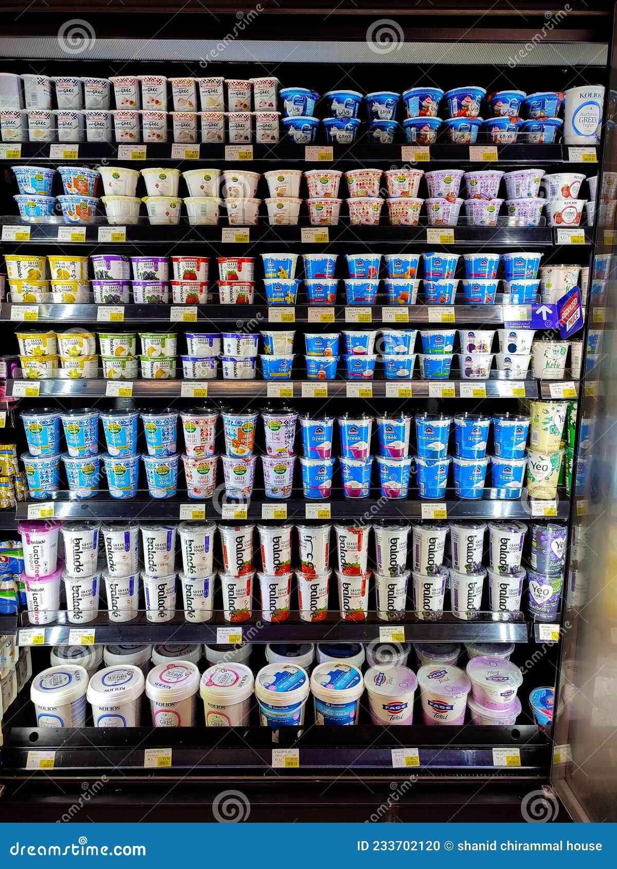 Tidy Display of Different Types of Greek Yogurt Products at Carrefour ... Tidy Display of Different Types of Greek Yogurt Products at Carrefour ...