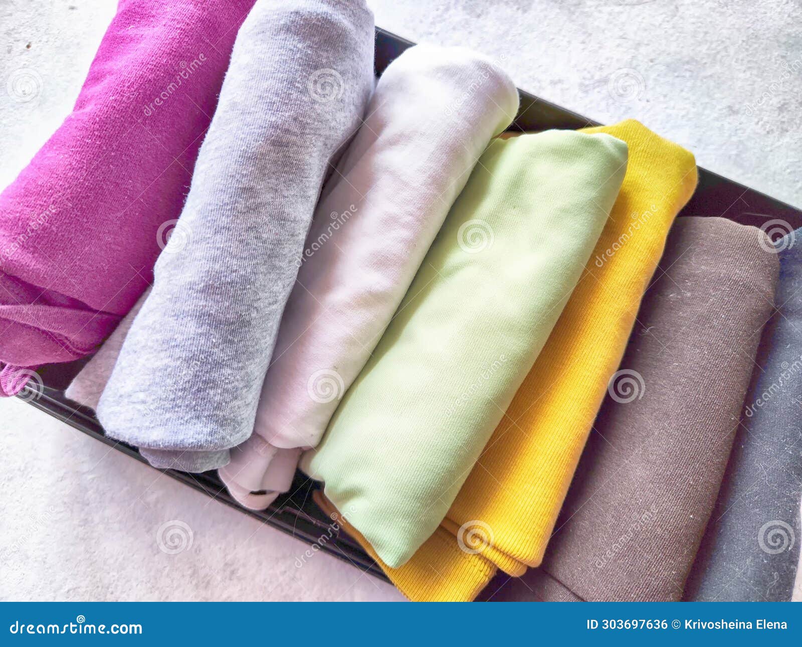 Tidy and Organized Clothes with the Konmari Method. Storage of T-shirts ...