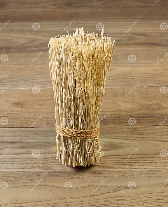 Tied Bundle of Straw on Rustic Wood Stock Photo - Image of wicker ...