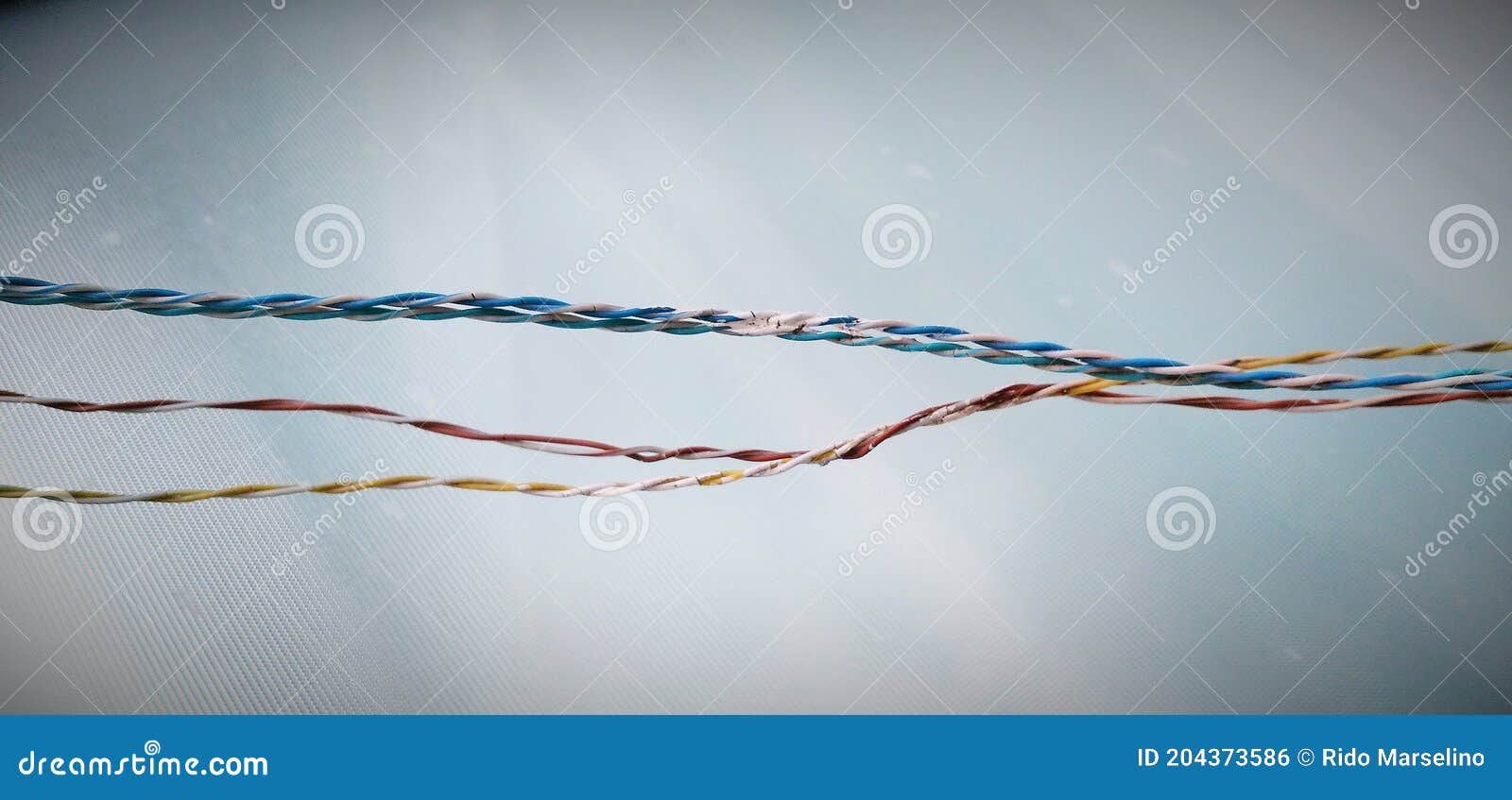 Tied Long Coiled Wire Cable Stock Photo - Image of circle, jewellery ...