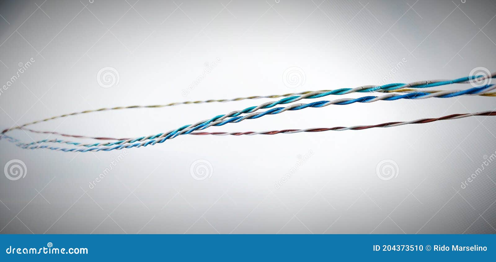 Tied Long Coiled Wire Cable Stock Photo - Image of font, wing: 204373510