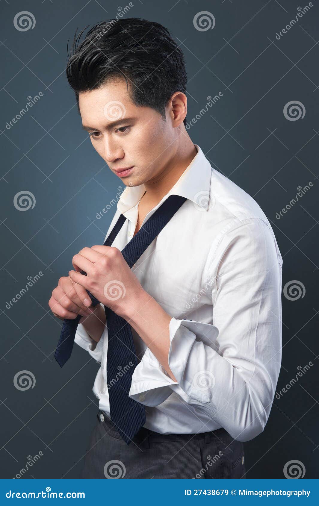 Tieing the Tie stock image. Image of formal, male, handsome - 27438679