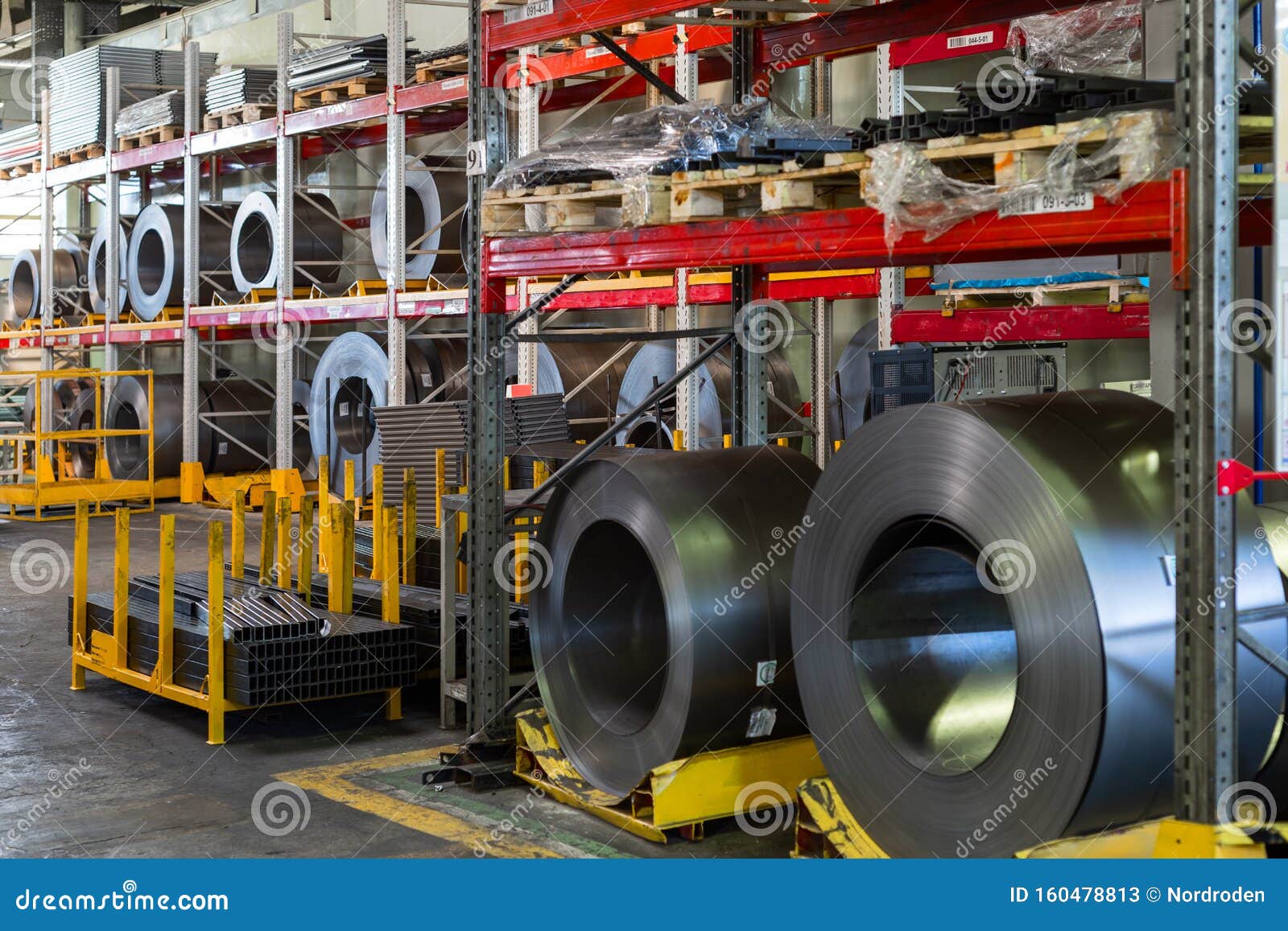 Tiered Rack with Sheet Metal Rolls. Internal Warehouse of Raw Materials ...