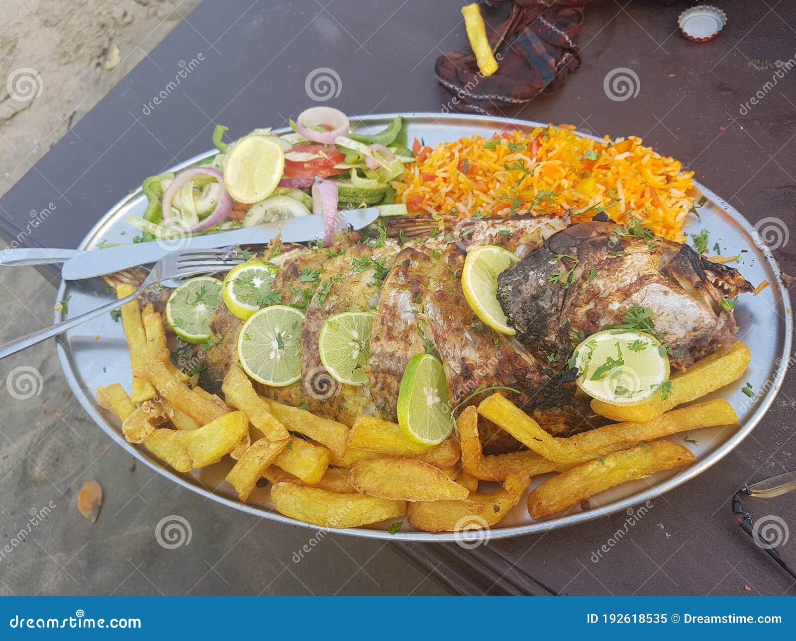 Tiger Fish Dish Dish with Lemmon at Beach Stock Image - Image of dish ...
