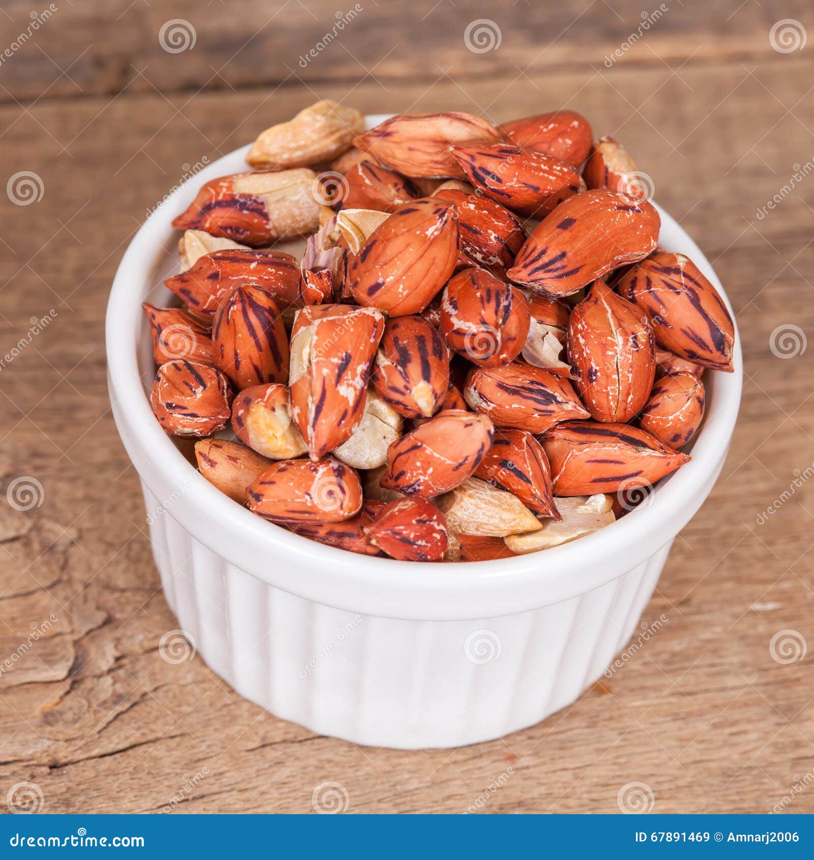 Tiger Peanut in Bowl on Wood Stock Image - Image of white, tiger: 67891469