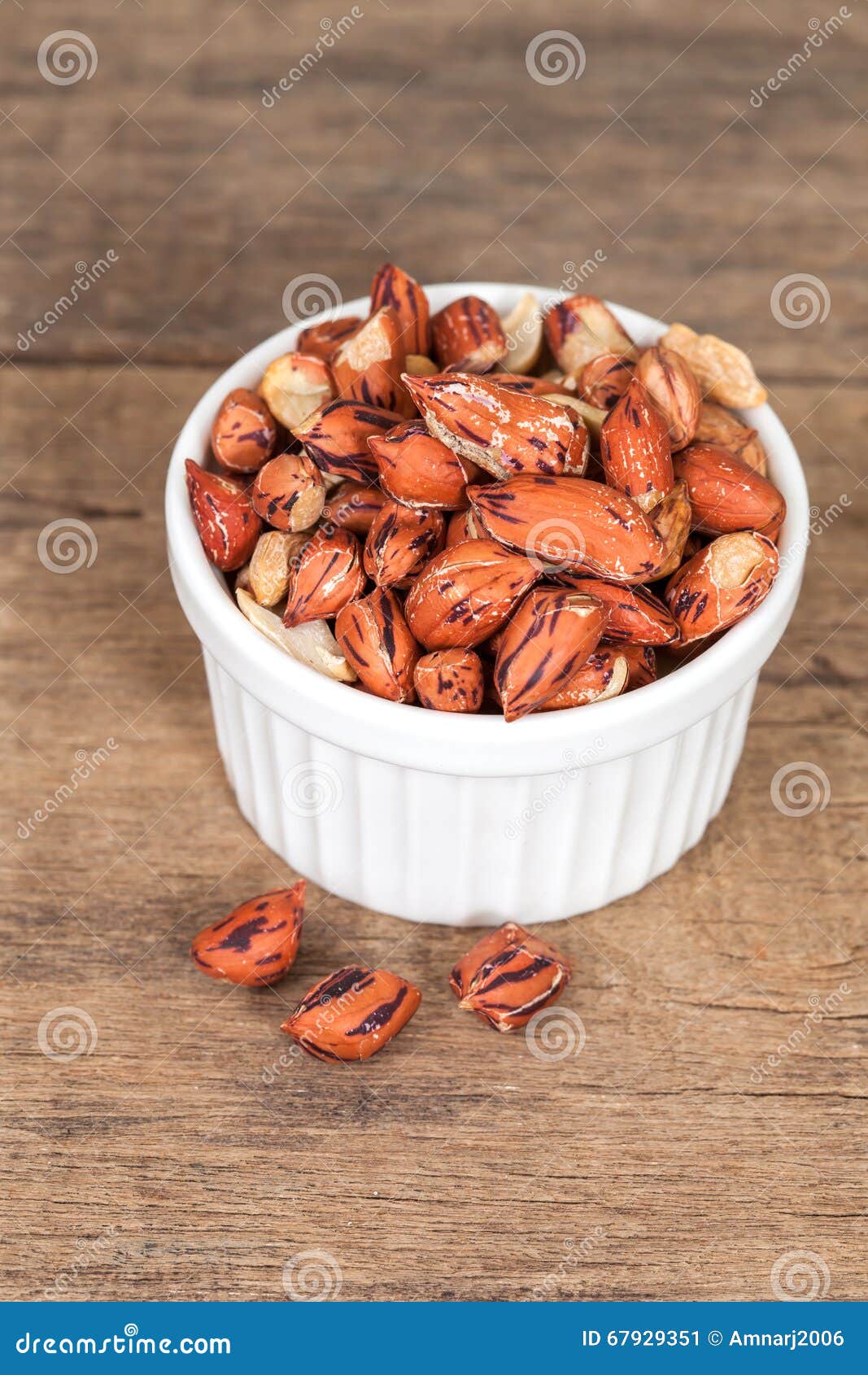Tiger Peanut in Bowl on Wood Stock Image - Image of salted, peanuts ...