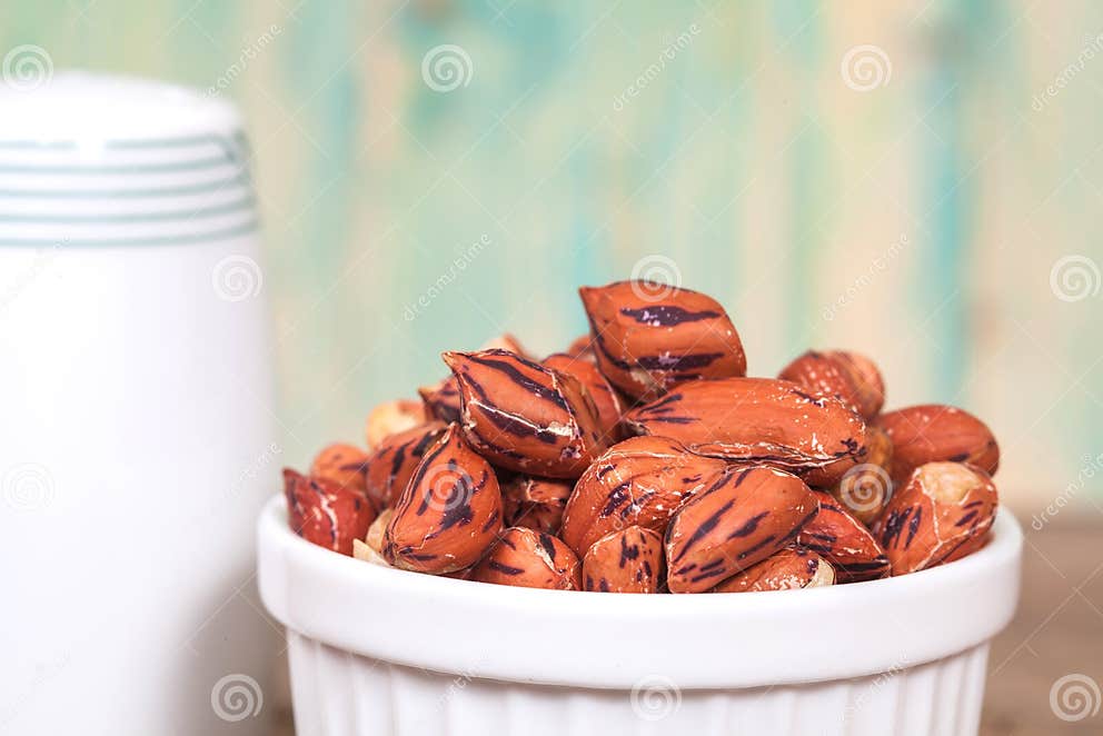 Tiger Peanut in Bowl on Wood Stock Image - Image of macro, closeup ...