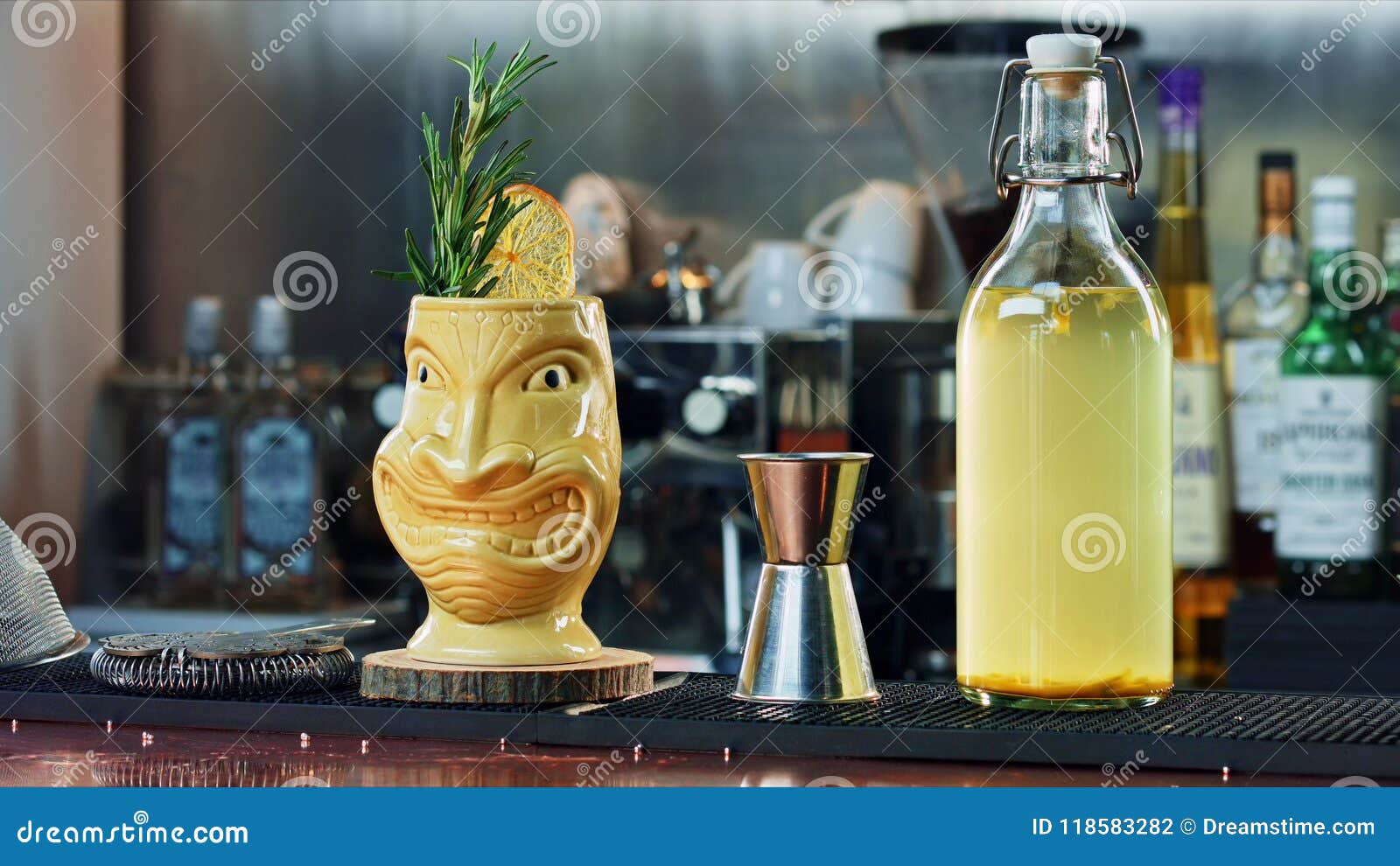 Tiki cocktail at the bar stock photo. Image of bartender - 118583282
