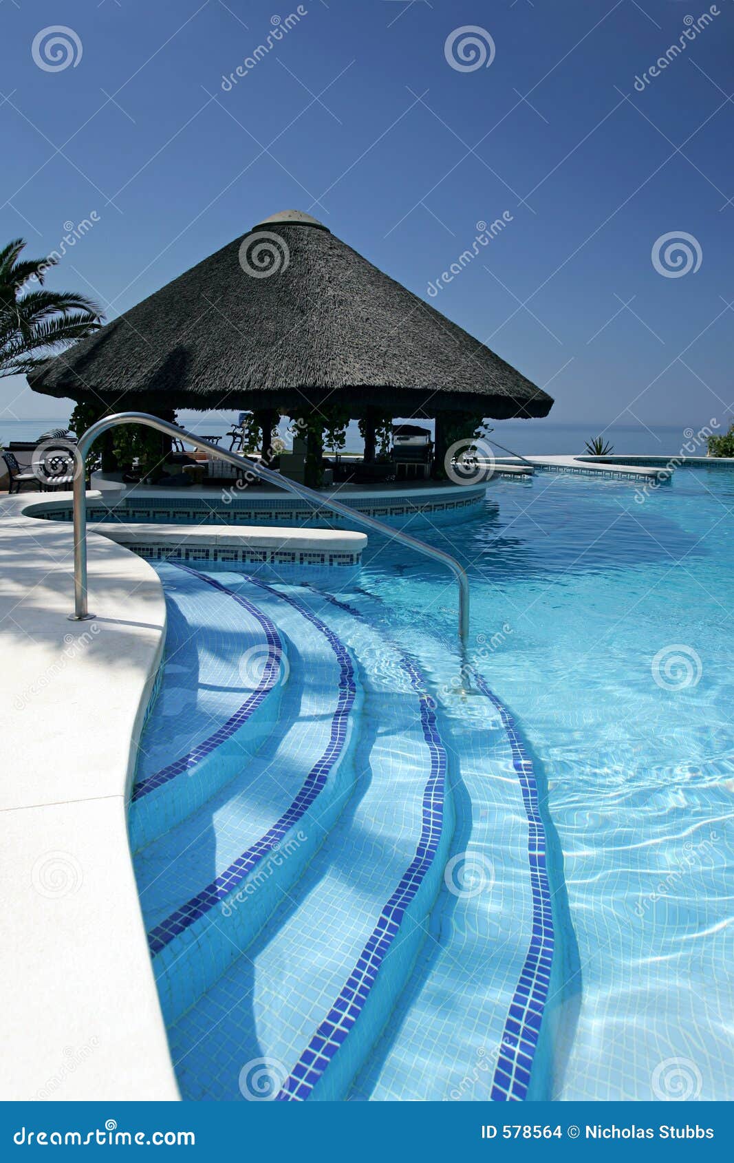 Tiki Hut and Bar by Swimming Pool of Luxury Hotel Stock Photo - Image ...