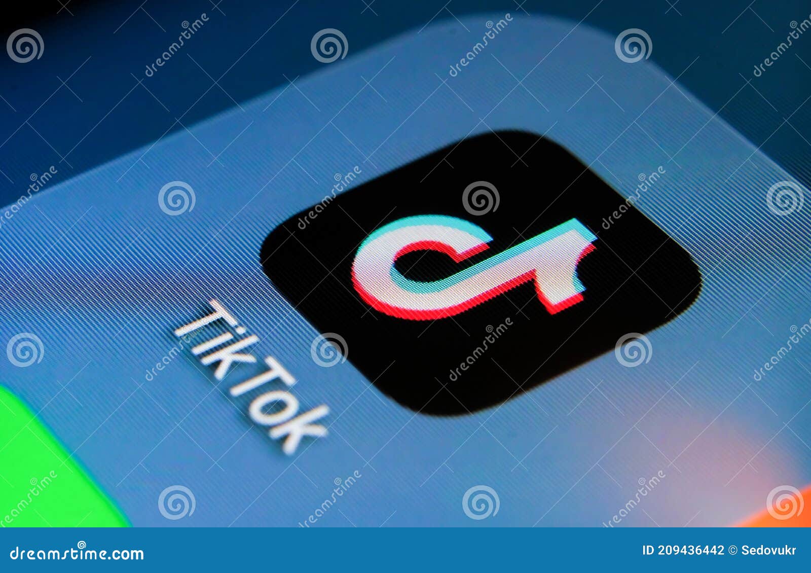 TikTok App on the Smartphone Screen with Visible Pixels. Selective ...