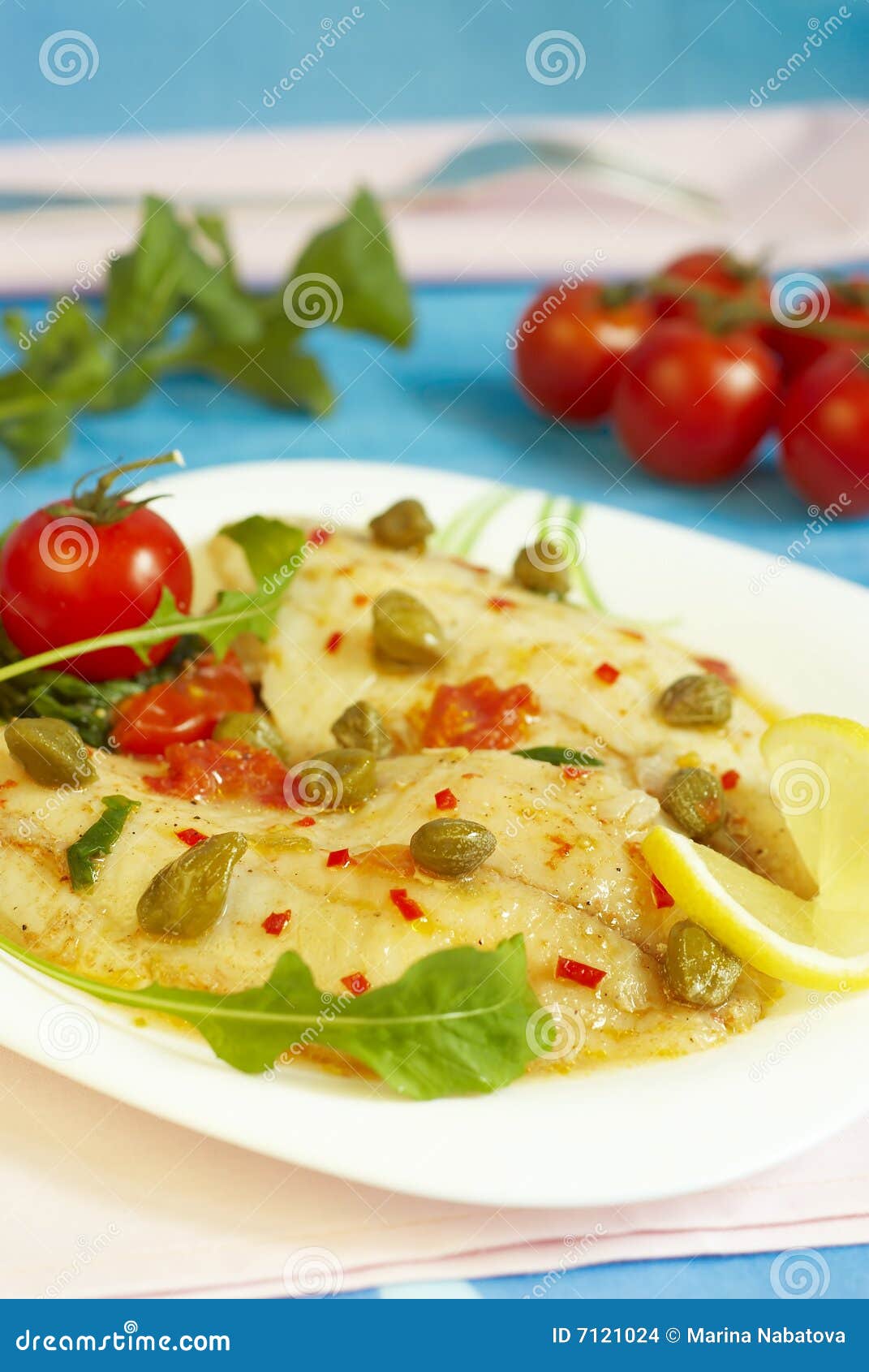 Tilapia fish with capers stock photo. Image of marinaded - 7121024