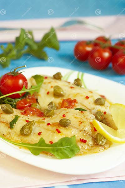Tilapia fish with capers stock photo. Image of marinaded - 7121024