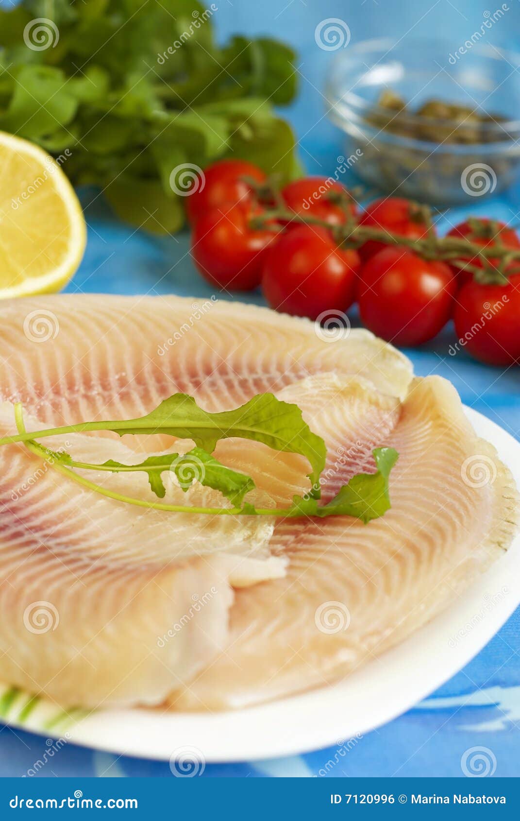 Tilapia fish ready to cook stock photo. Image of napkin - 7120996
