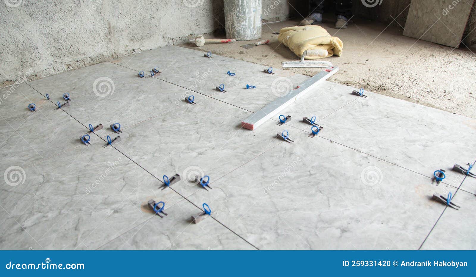 Tile Alignment System. Renovating the Floor Stock Photo - Image of work ...
