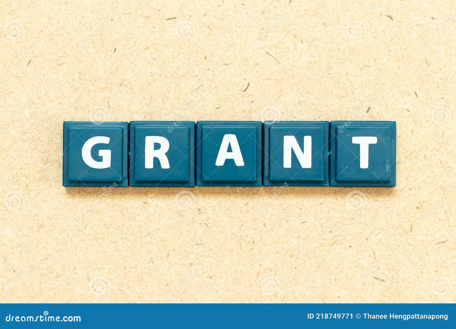 Tile Letter in Word Grant on Wood Background Stock Image - Image of ...