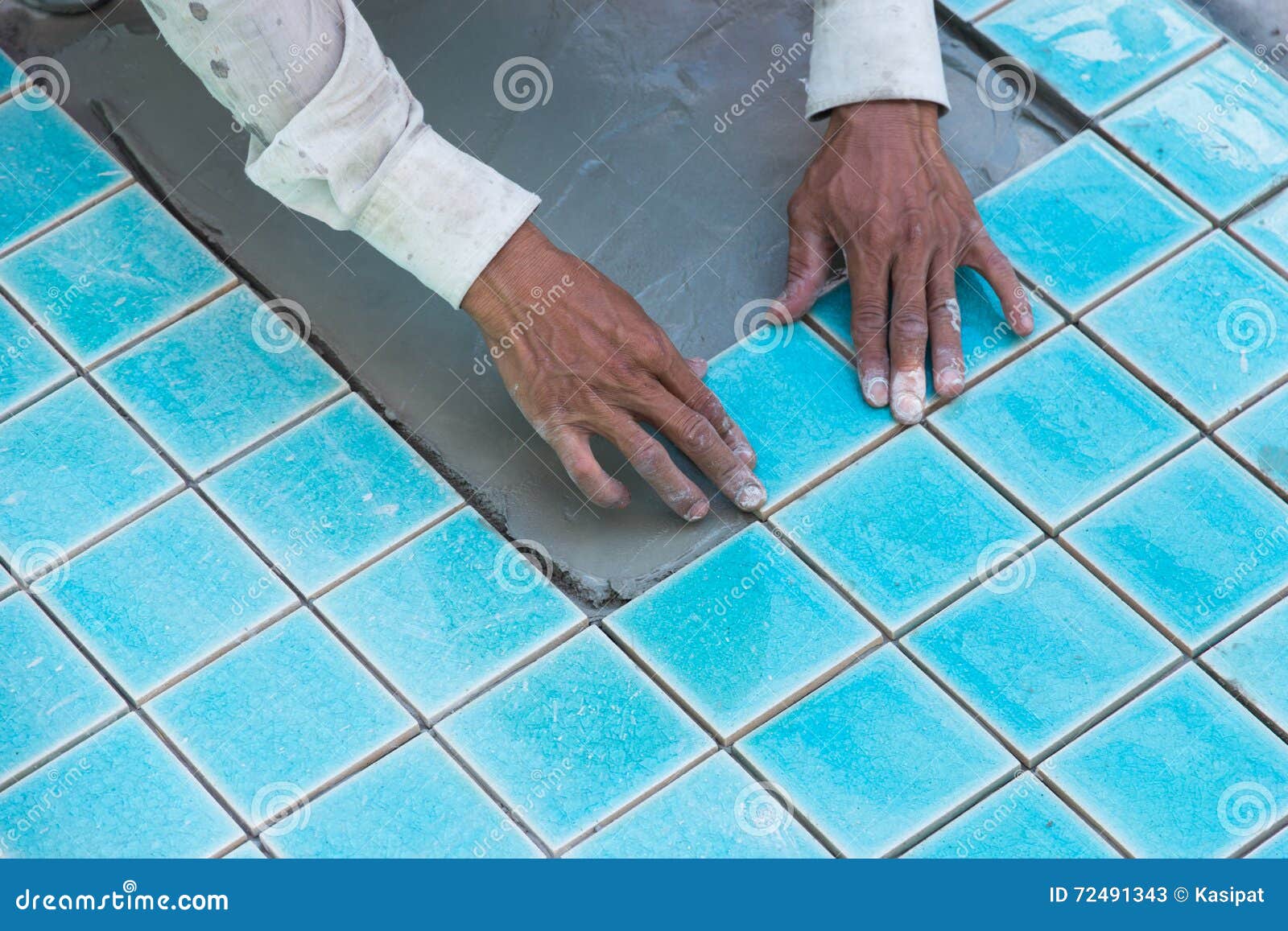 Tile builder swimming pool stock image. Image of handyman - 72491343