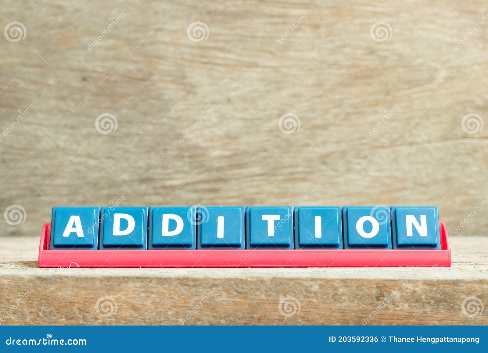 Tile Letter on Rack in Word Addition on Wood Background Stock Photo ...