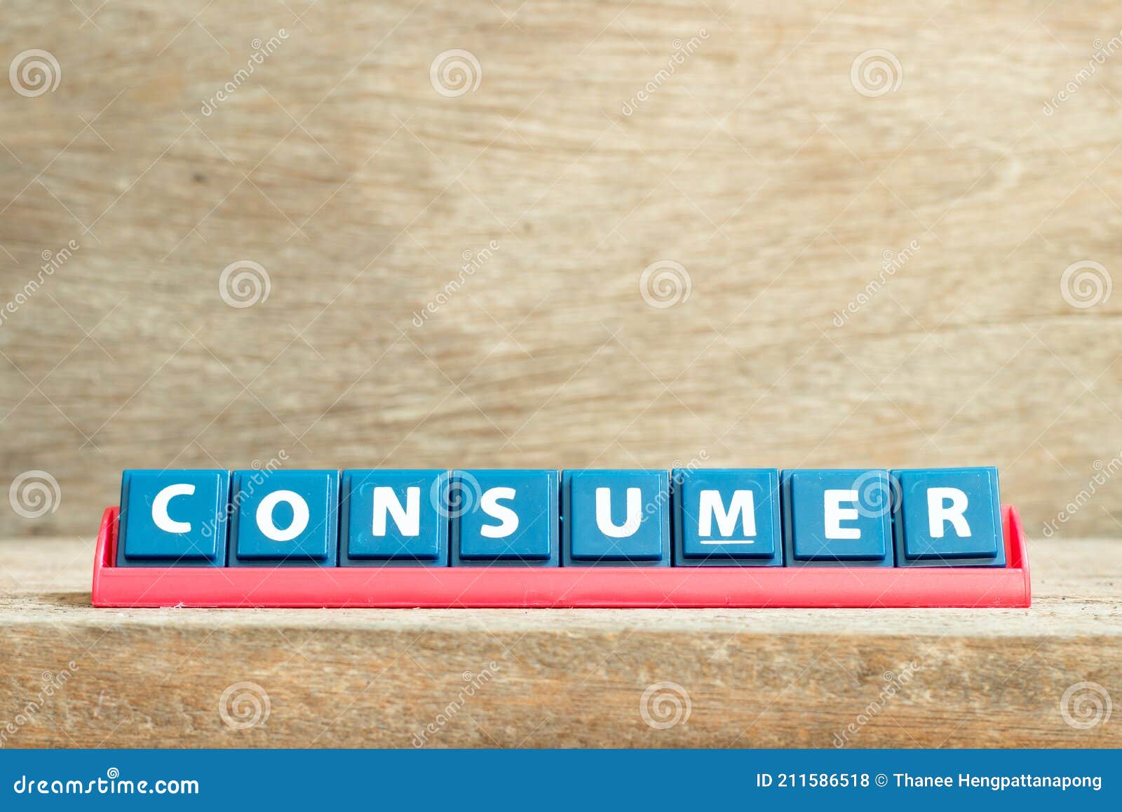 Tile Letter on Rack in Word Consumer on Wood Background Stock Photo ...