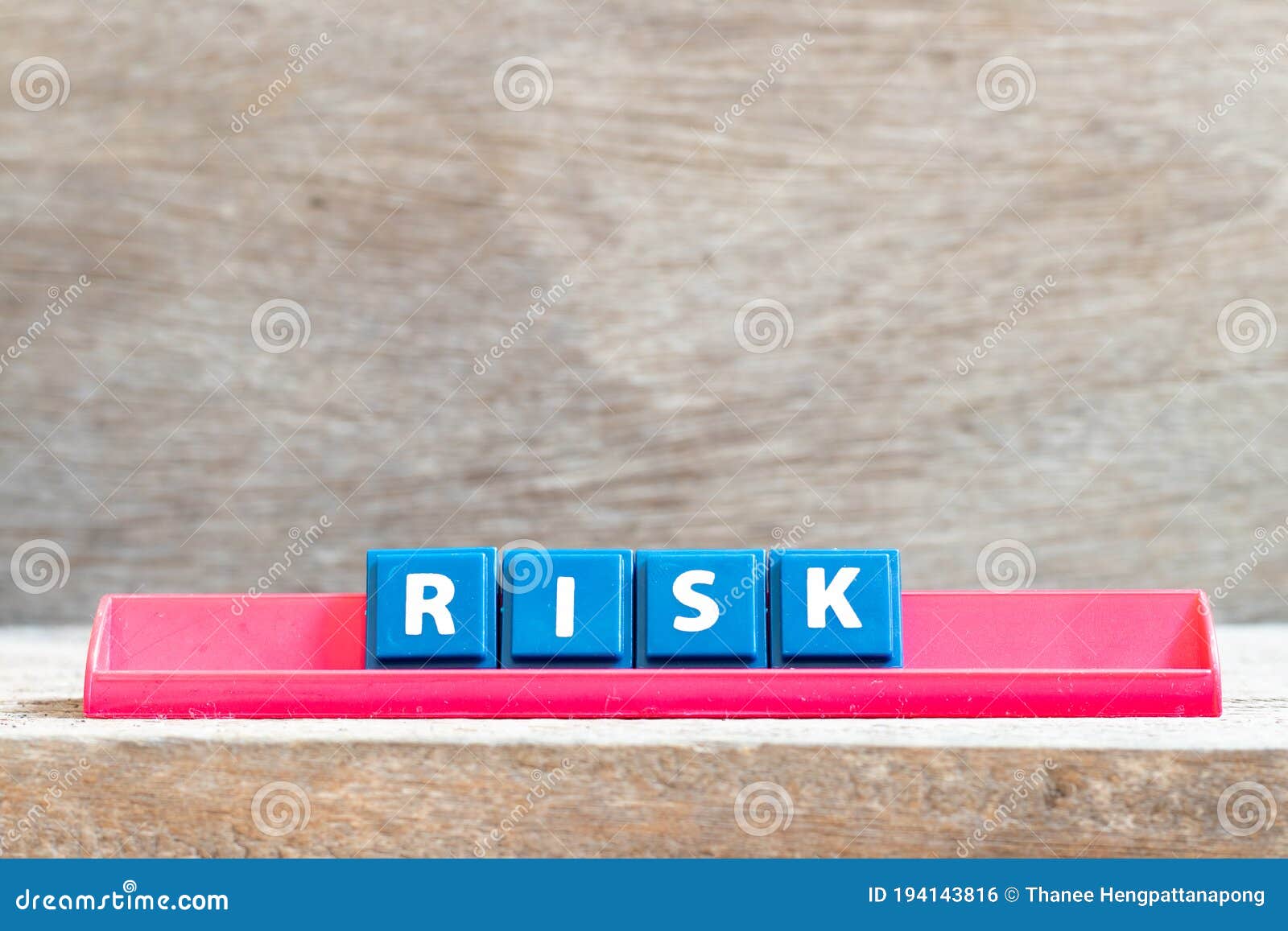 Tile Letter on Rack in Word Risk on Wood Background Stock Photo - Image ...