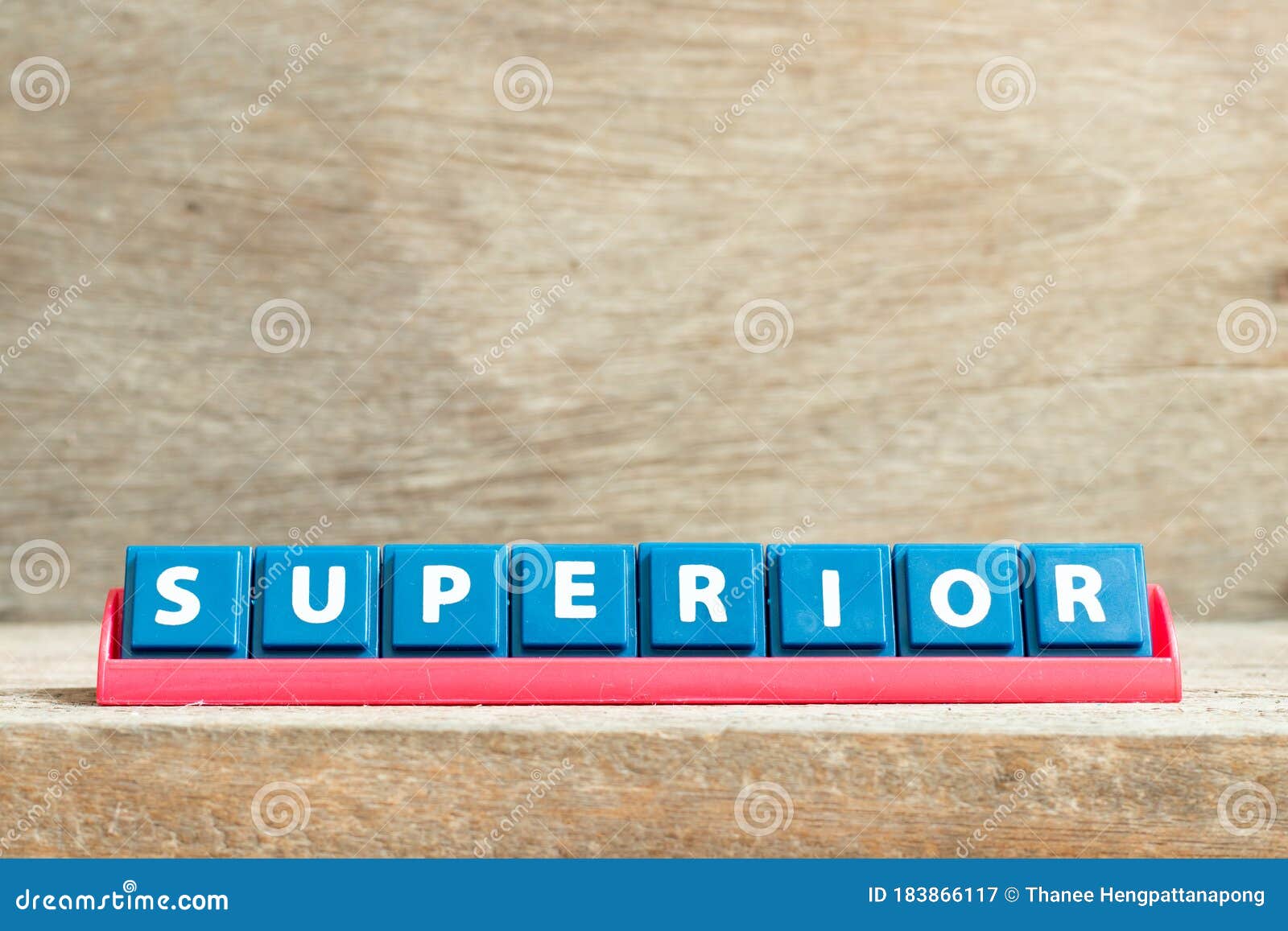 Tile Letter on Rack in Word Superior on Wood Background Stock Image ...