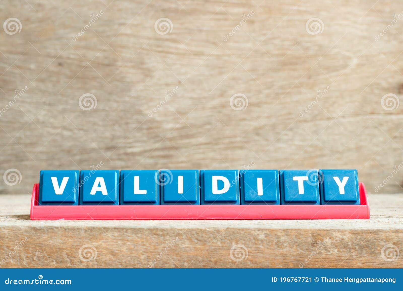 Tile Letter on Rack in Word Validity on Wood Background Stock Image ...