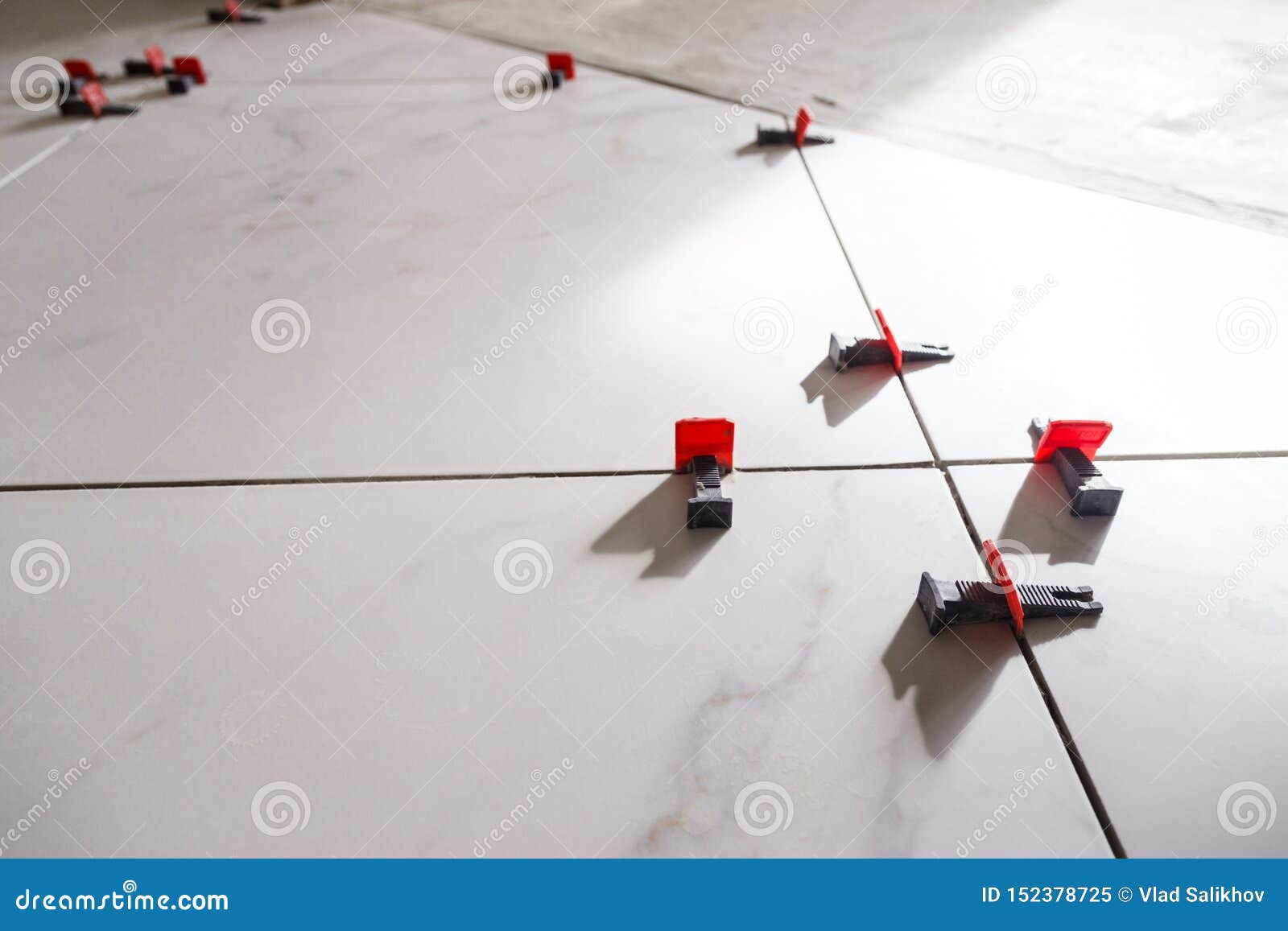 Tile Leveling System with Plastic Clips and Wedges Stock Image - Image ...