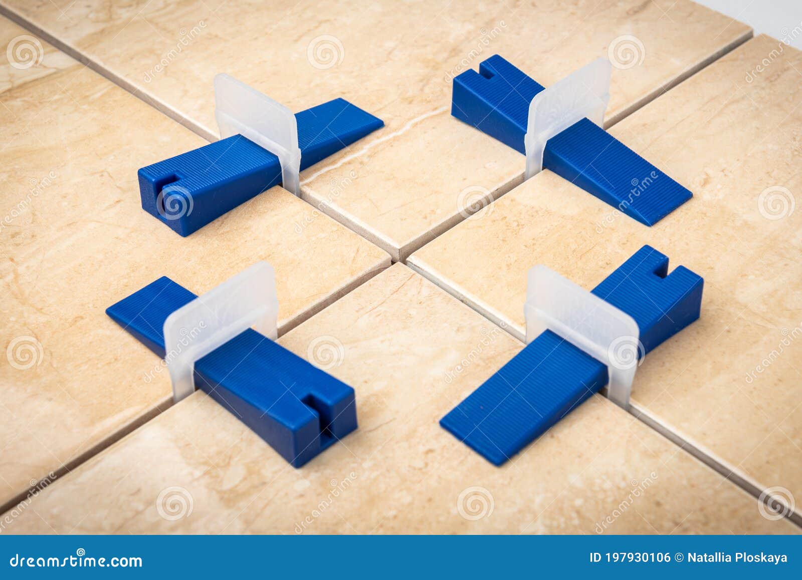 Tile Levelling System with Plastic Clips and Wedges Stock Photo - Image ...